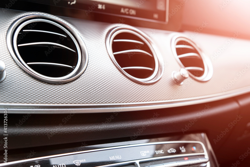 AC ventilation deck in luxury modern car Interior. Modern car black ...
