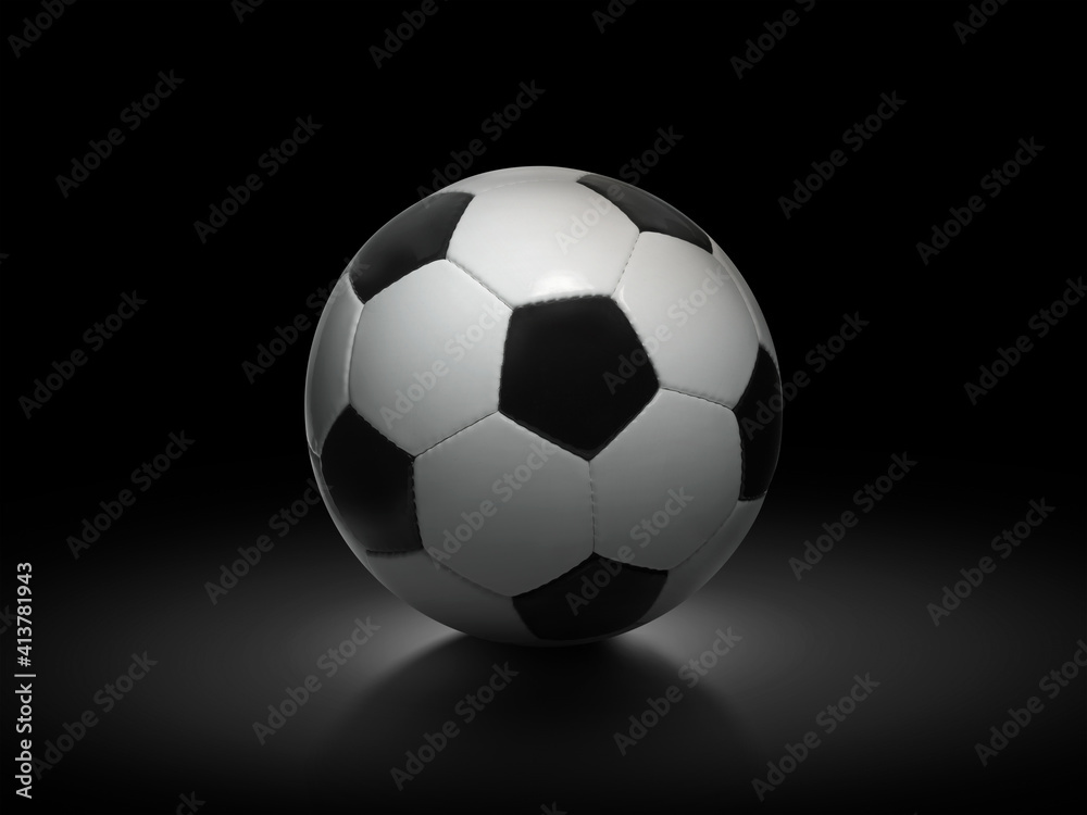 Soccer ball on black background Stock Photo | Adobe Stock