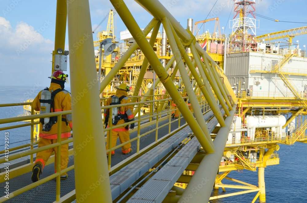 Fire drill training on board for the crew in ship on offshore plant ...