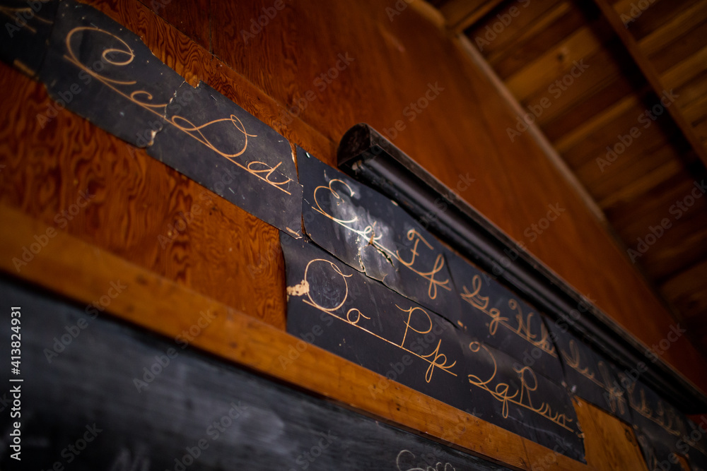 Cursive alphabet on wall in one room school house Stock Photo | Adobe Stock