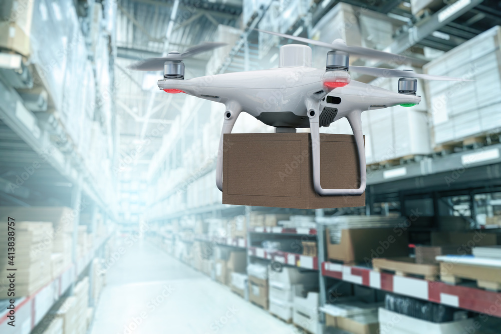 Drone with a package in a distribution warehouse. Unmanned delivery ...