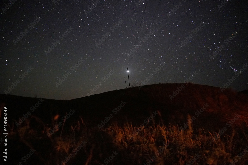The bright starlight of the night sky. The milky way, meteorites and ...