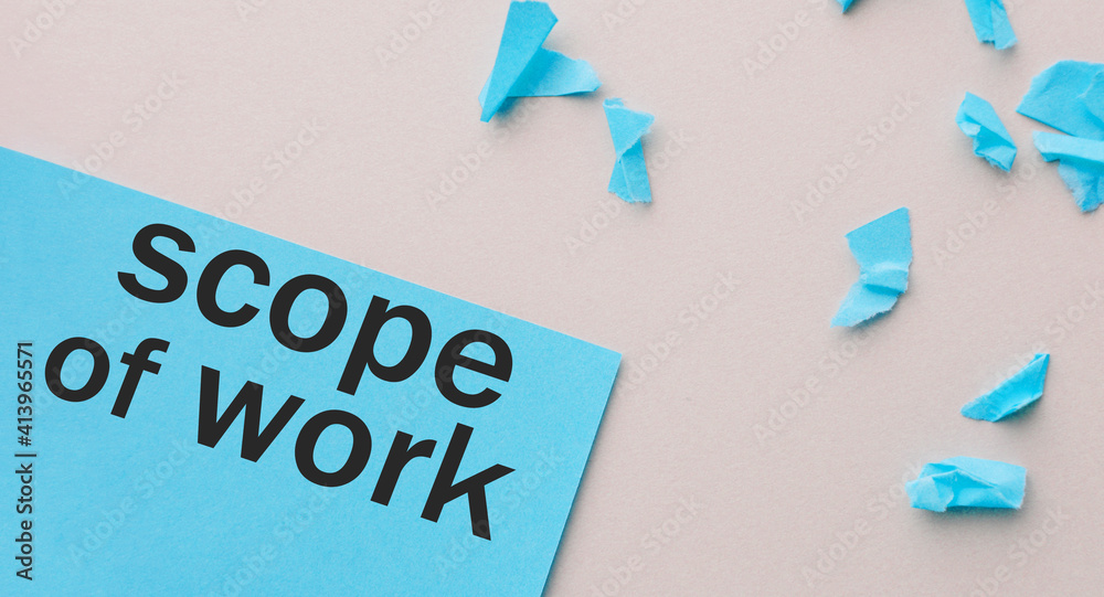 scope of work is the text on a BLUE sheet of paper and torn pieces of ...