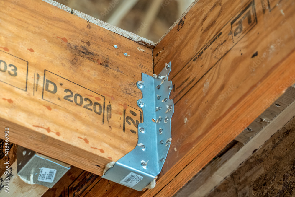 Close up of galvanized metal connector plates, rafter for wood, trusses ...