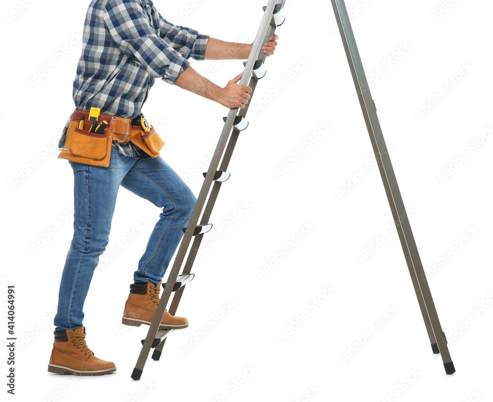 Professional builder climbing up metal ladder on white background ...
