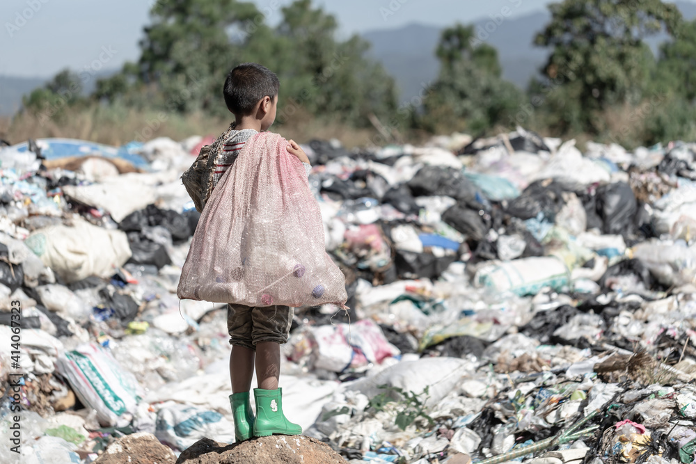 Poor children stand on garbage, human trafficking, child labor. Stock ...
