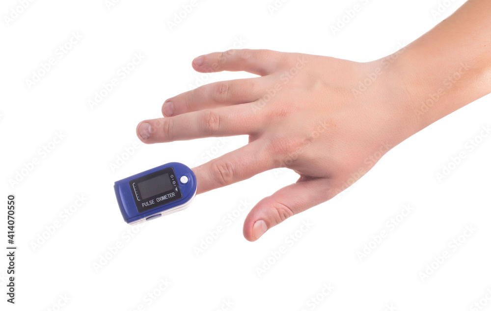Oximeter on the finger of a person on a white background. Concept for ...