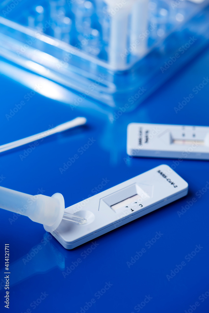 placing sample into a covid-19 rapid antigen test Stock Photo | Adobe Stock
