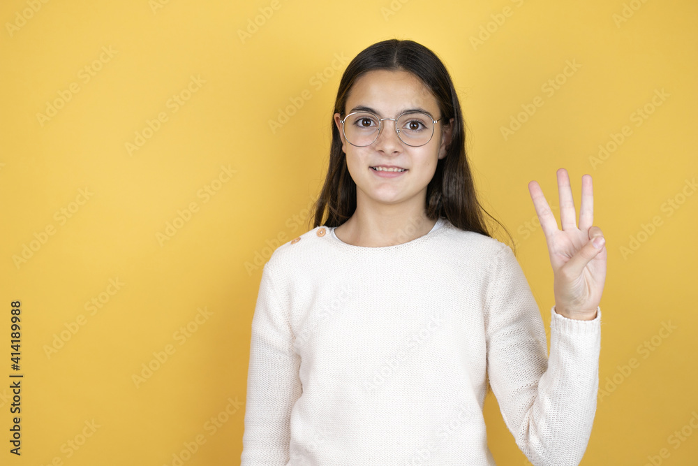 Beautiful child girl wearing casual clothes showing and pointing up ...