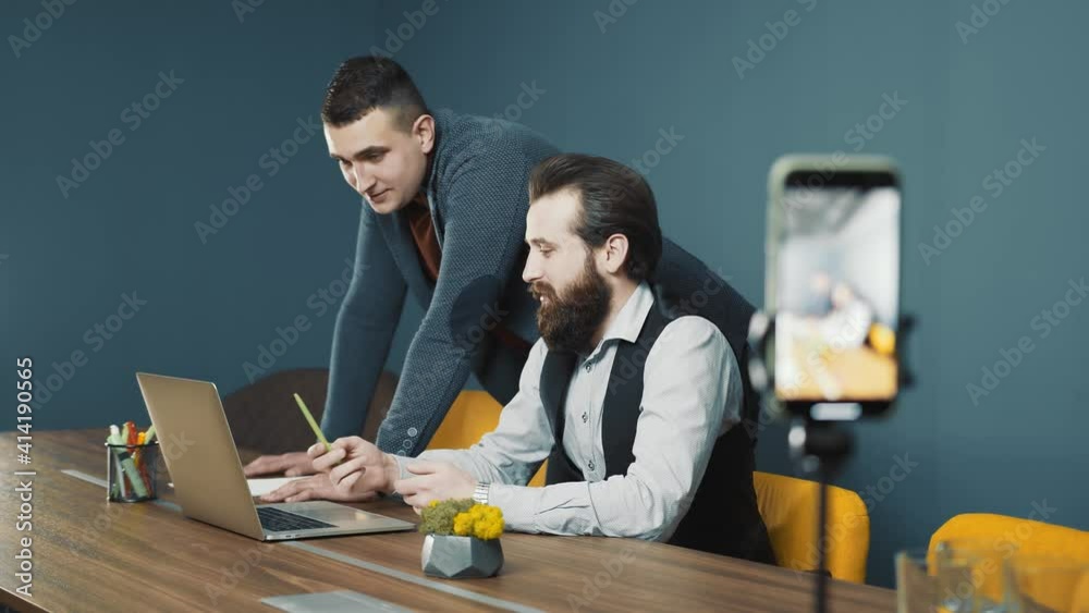 Broadcast a meeting of two young people discussing a business strategy ...