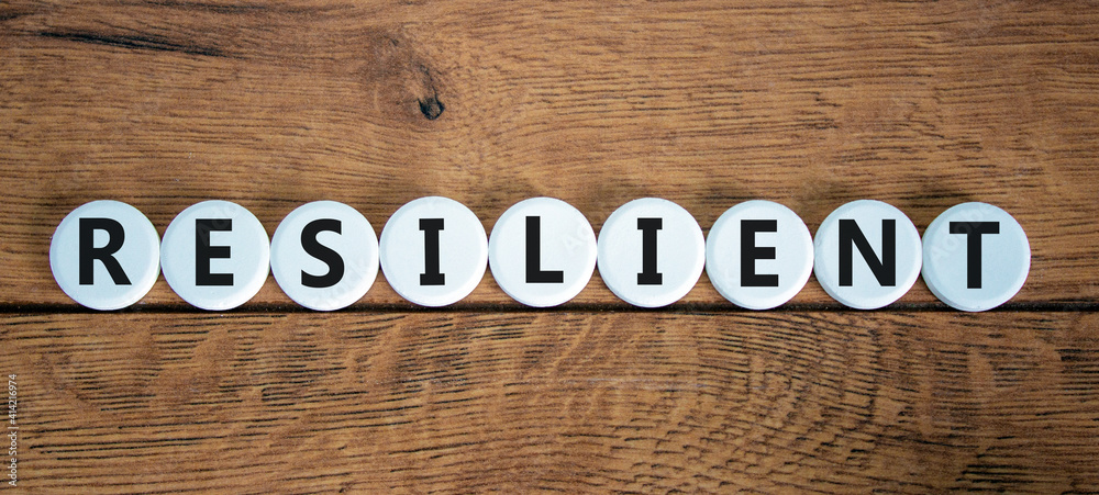 Resilient symbol. White circles with the word 'resilient'. Beautiful ...