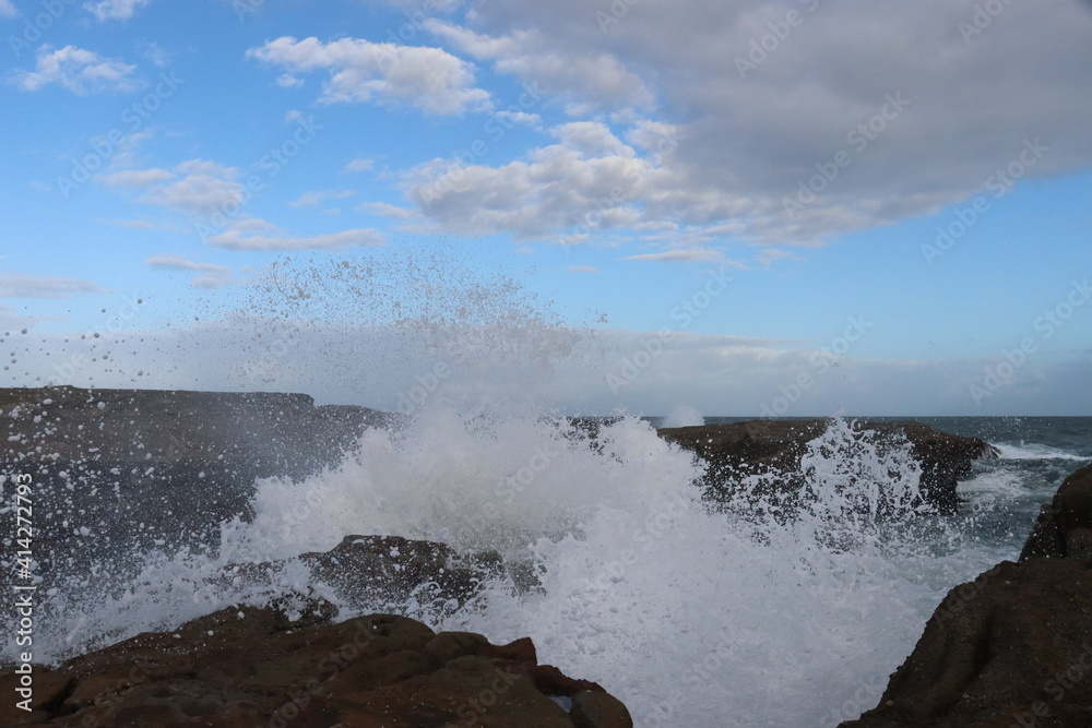 Sea waves impacts on this rock platform down below from the Norah head ...