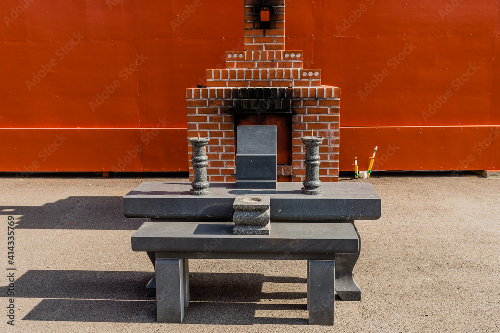 Altar tables with candlesticks and incense setting burner in front of ...