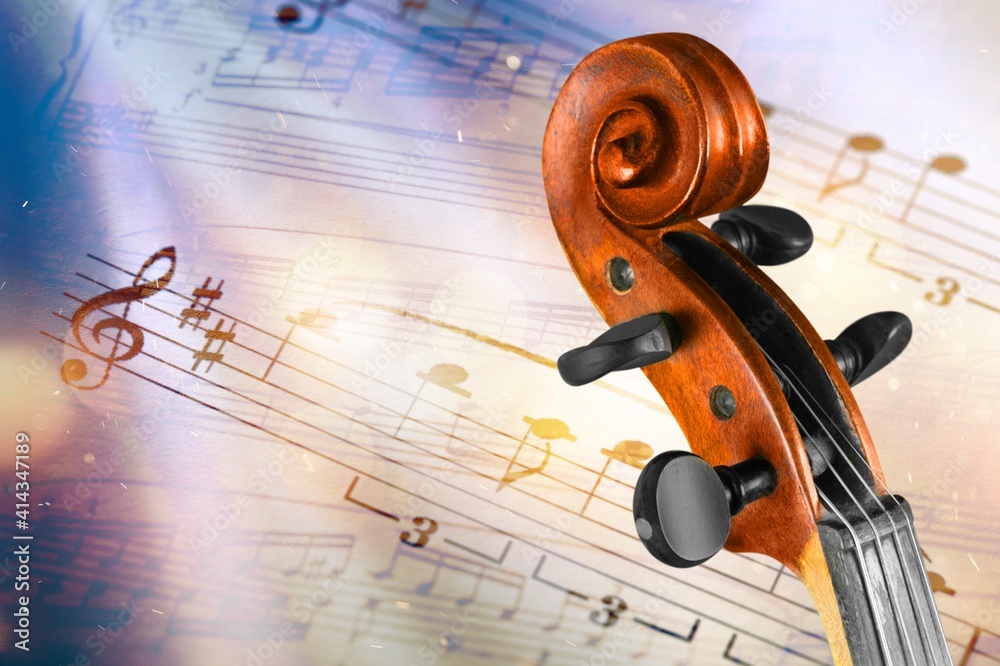 Sheets with music notes and the classic violin Stock Photo | Adobe Stock