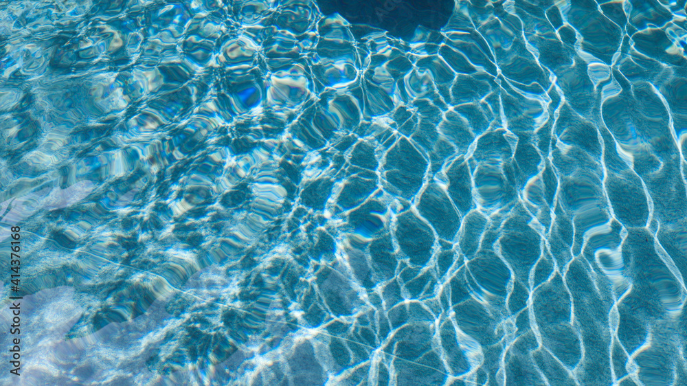 Abstract pool water. Swimming pool bottom caustics ripple and flow with ...