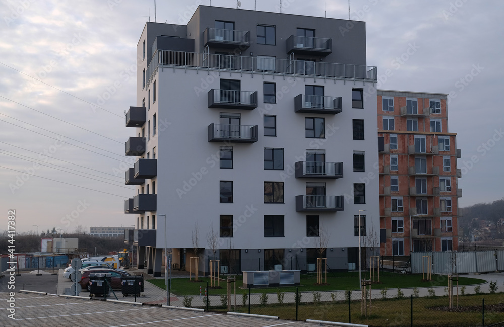 Modern tall condominium apartments building. View on the windows and ...