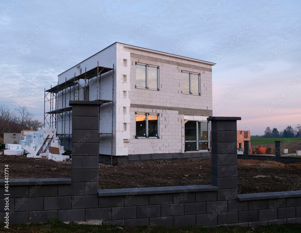 View of an unfinished two-storey house, typical modern suburban house ...
