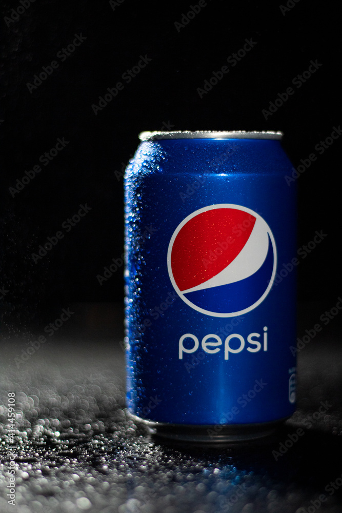 Pepsi soda can with water drops splashes on black background editorial ...