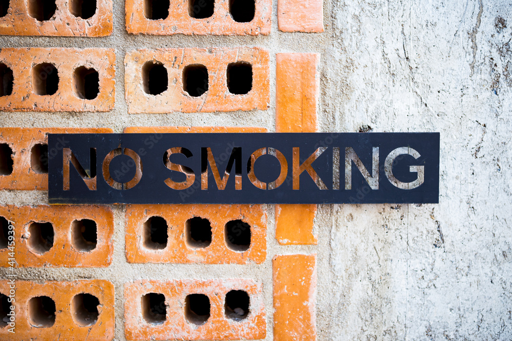 Design metal sheet no smoking sign on brick wall, sign and simbol, none ...