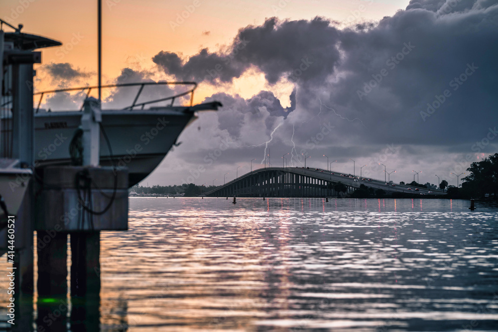 sea bridge boat sky clouds rain lightning rays miami florida horizon ...