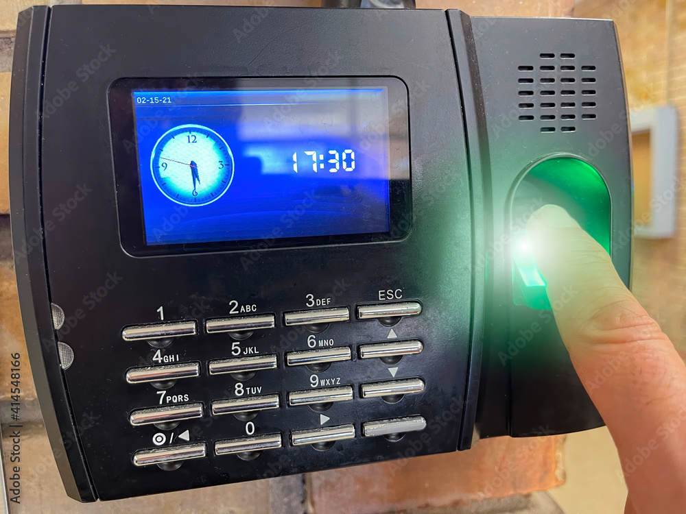 one finger over a fingerprint scanner entrance control with a digital ...