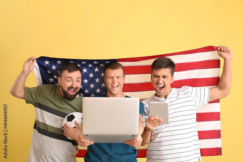 Happy men after winning of their sports bet on color background Stock ...