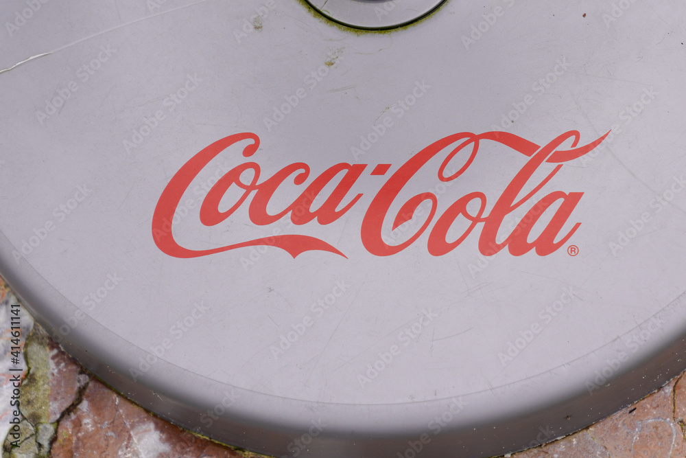 Coca Cola sign brand and text logo on table coffee pub terrace cafe ...