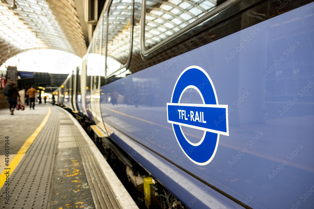 London- February, 2021: TFL Rail train logo on side of train at ...