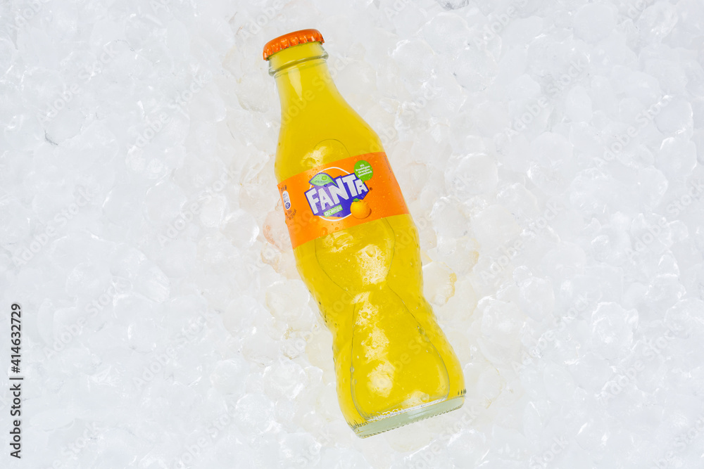 Fanta orange lemonade soft drink bottle ice cubes Stock Photo | Adobe Stock