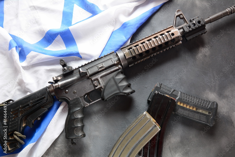 M4 carbine with Israeli flag on the background. Yom Ha'atzmaut ...