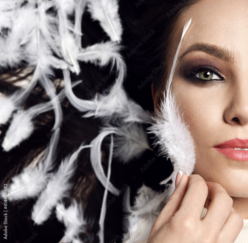 Half-face portrait of graceful gorgeous brunette woman surrounded with ...