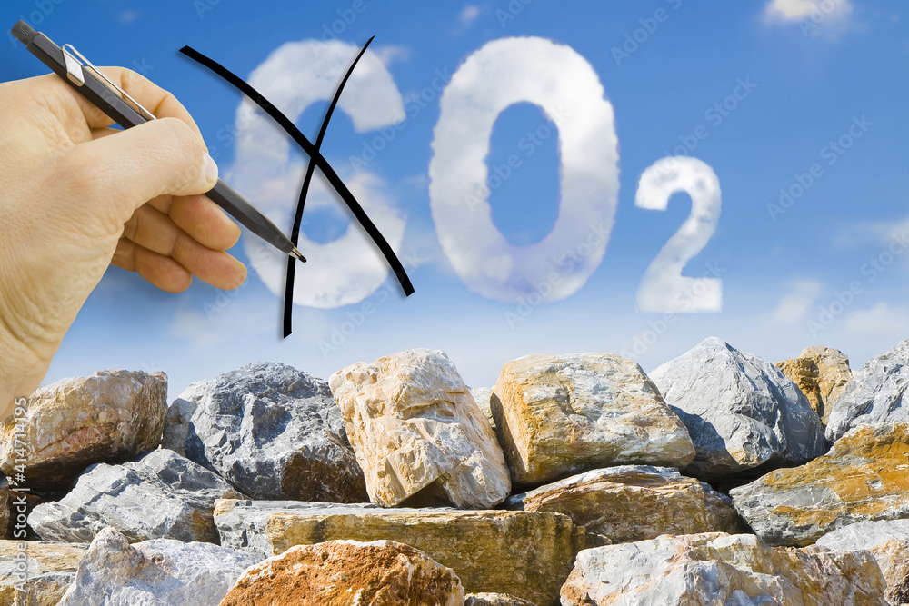 CO2 reduction concept image with hand erasing the carbon symbol Stock ...
