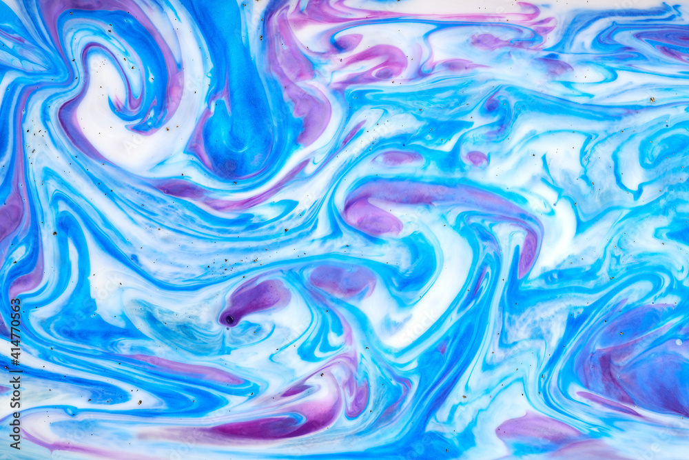 Currents of translucent hues, snaking metallic swirls, and foamy sprays ...