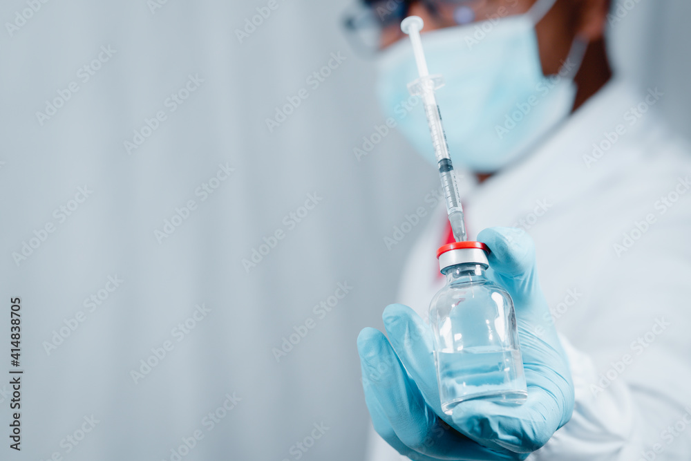 Doctor or scientist wearing antivirus clothing In the laboratory ...