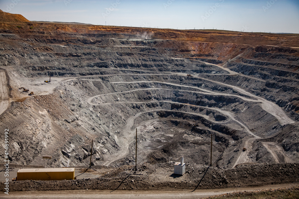 Copper ore open-pit mining (quarry) in steppe panorama. White gravel ...