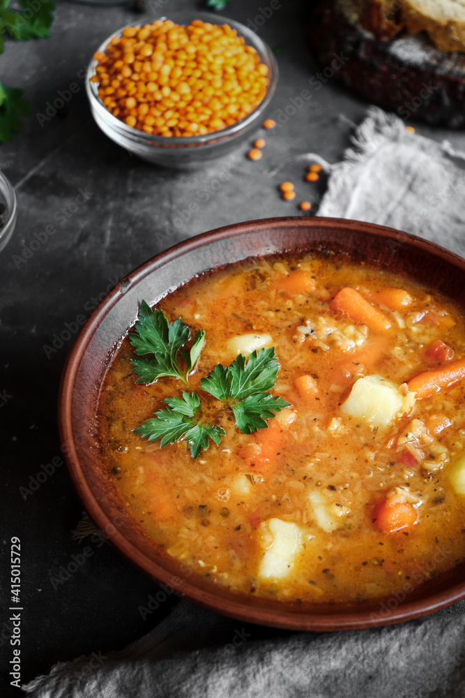 Red lentil soup. Dark background. Traditional spicy soup made from ...
