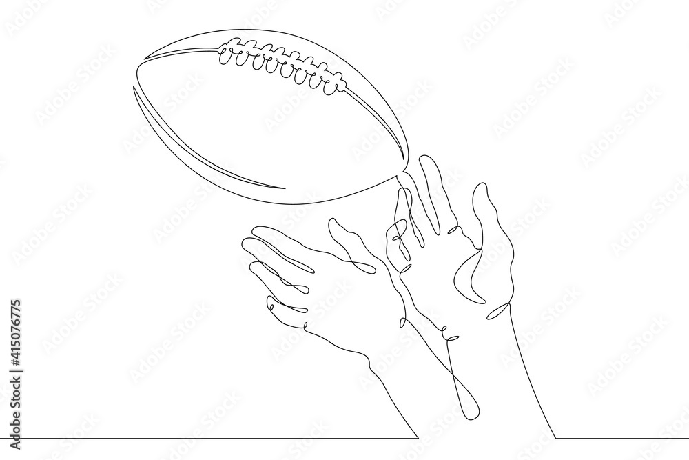 American football. Hands reach for the football and rugby ball in the ...