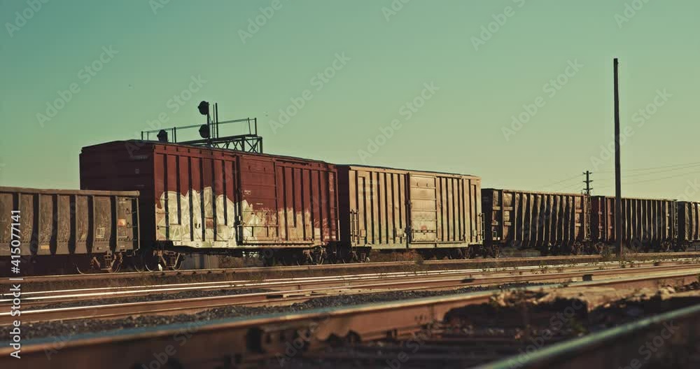Old Freight Train Tanker Cargo Cars Coming to a Stop at Empty Abandoned ...
