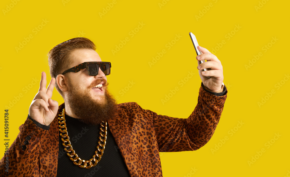 Eccentric rich man live video streaming on mobile phone. Happy ...