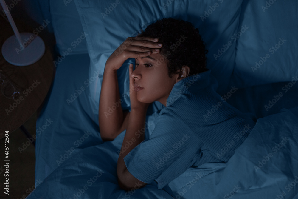 people, bedtime and rest concept - sleepless african american woman ...