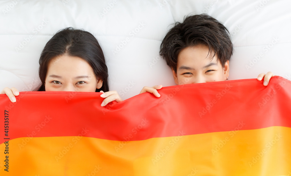 LGBTQ couple lovers, a handsome girl as a man or butch femme girl ...