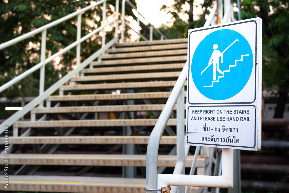 Foto de Warning sign information about safety walking cross on the ...