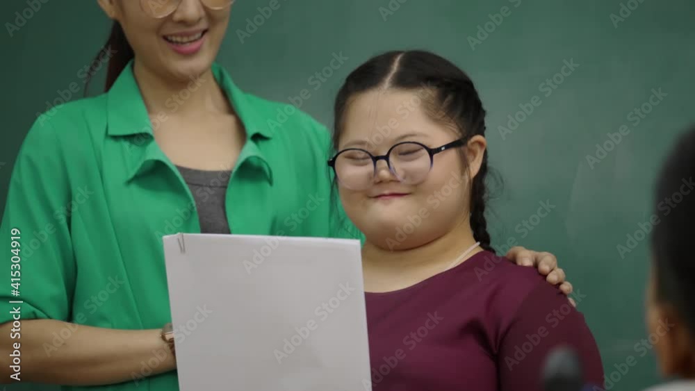 Asian girl with autism doing activities in classroom Practice your ...