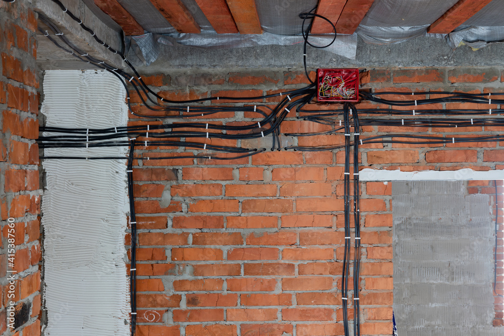 construction of a new cottage, a lot of electrical cables are assembled ...