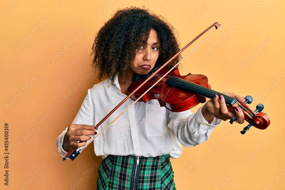 Sad Girl Playing Violin