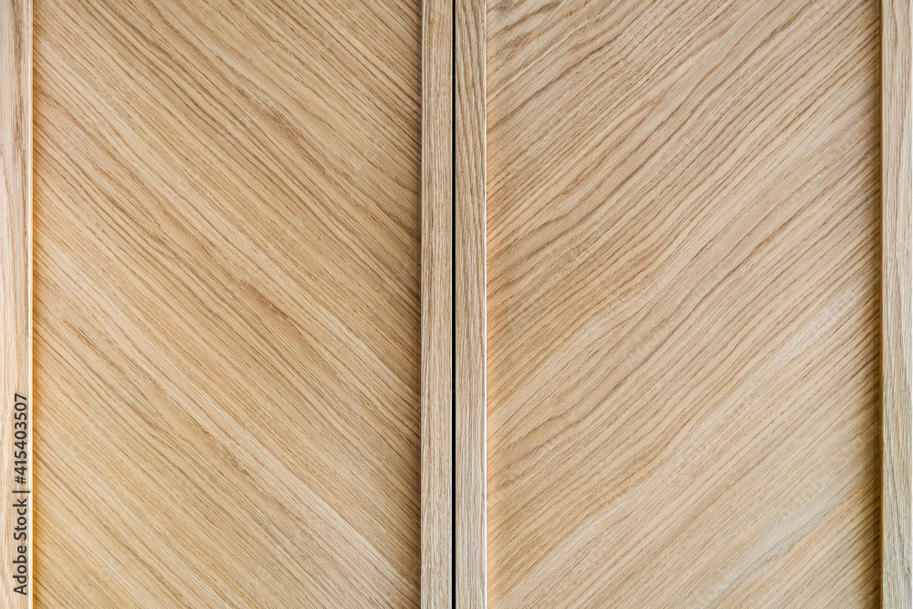 Modern wardrobe doors made of light veneer and solid oak with stylish ...