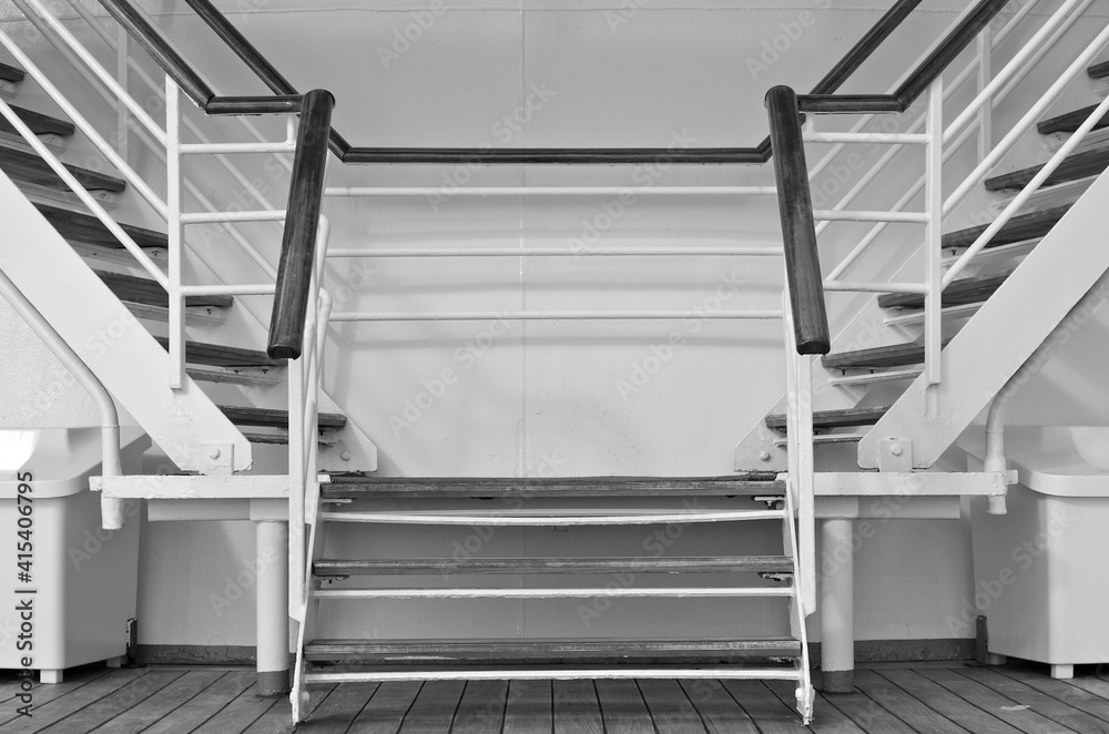 Metail reling with wooden handrail onboard modern cruiseship or cruise ...