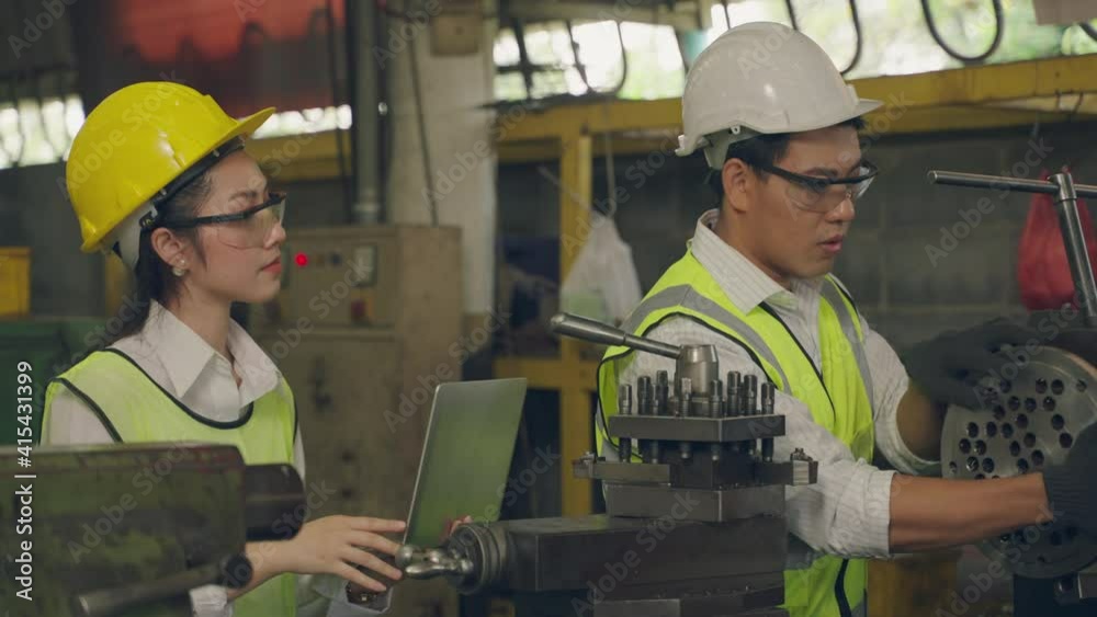 Professional mechanical engineer and operation team wearing uniform ...