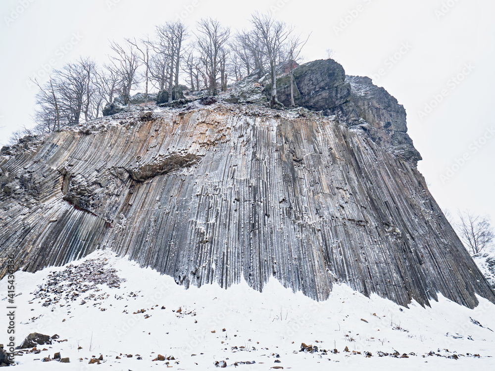 Zlaty vrch, peak of pentagonal and hexagonal basalt columns. Stock ...