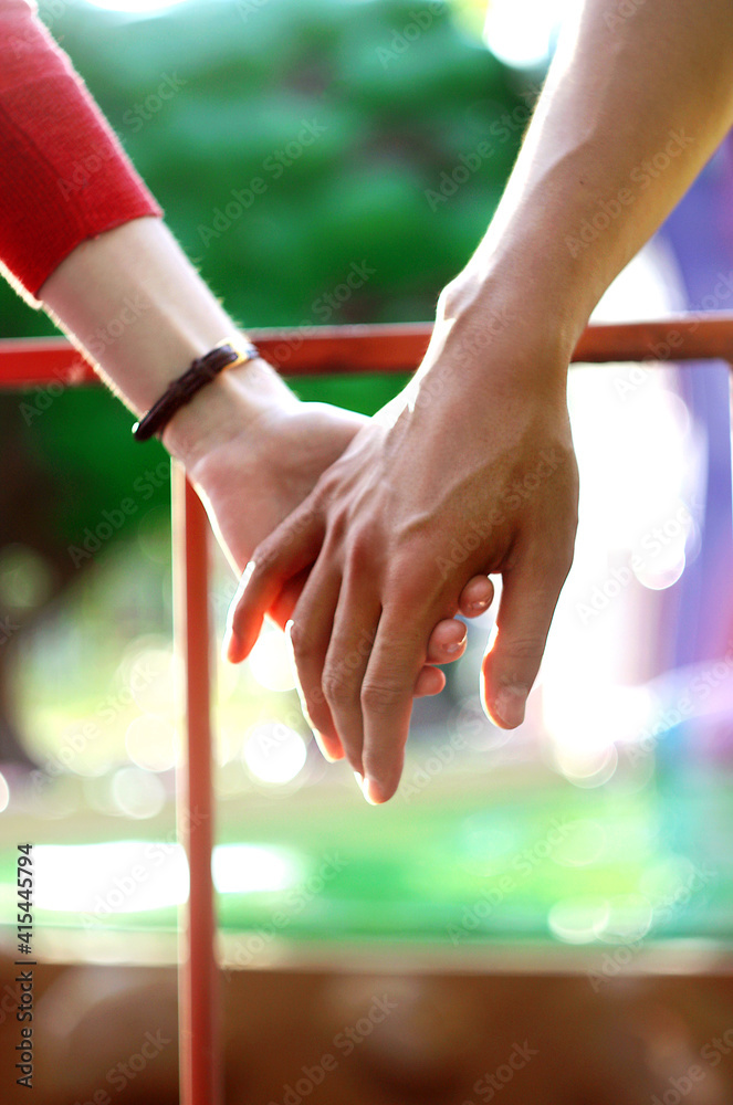 Lovers holding hands Couple Love story Stock Photo | Adobe Stock